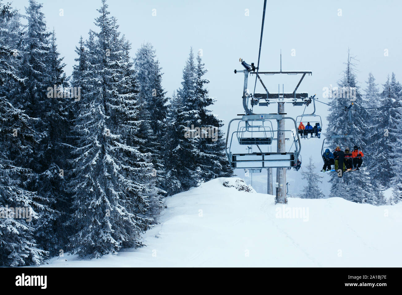 Ski lift in the forest Stock Photo - Alamy