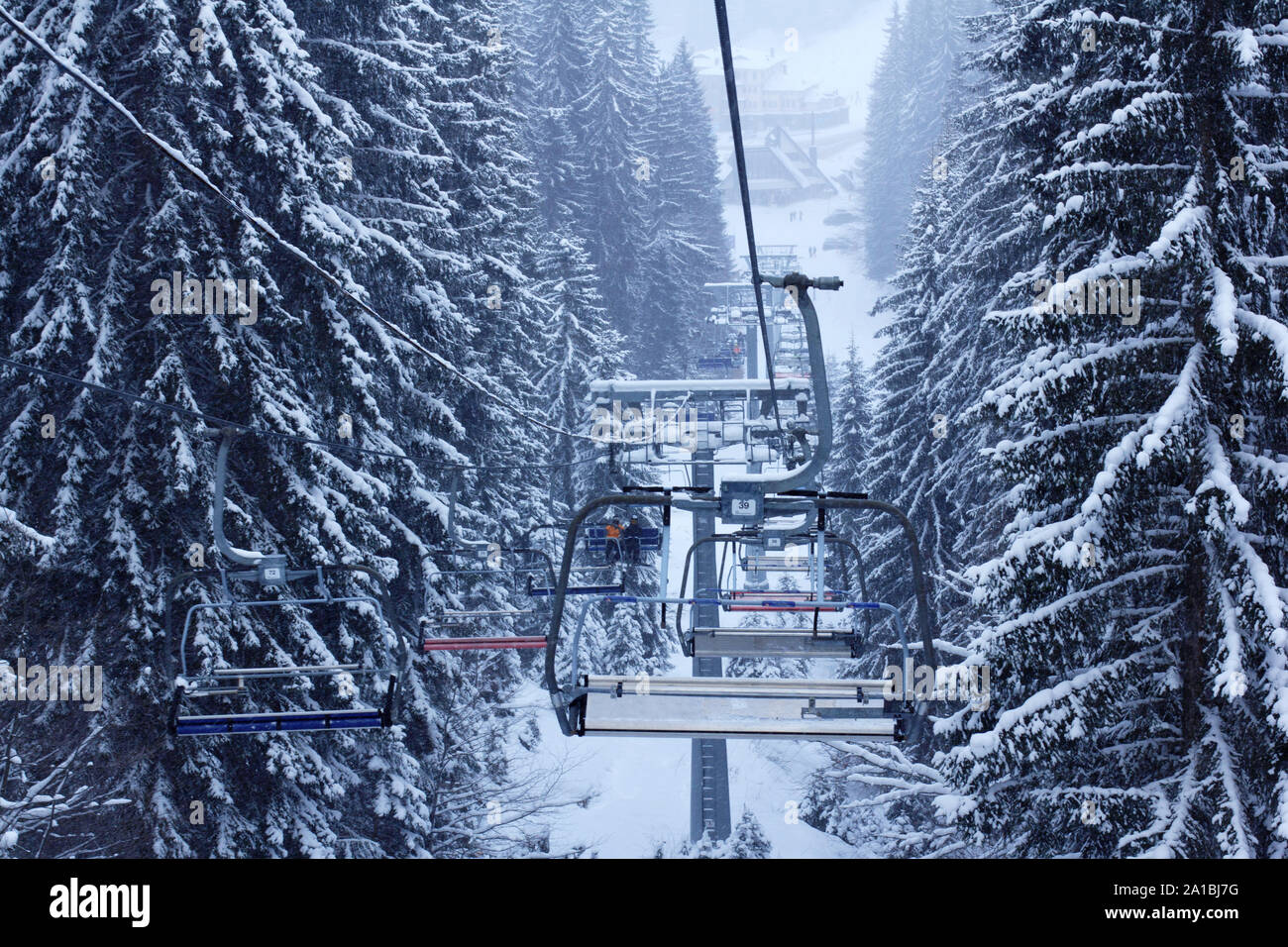 Ski lift in the forest Stock Photo - Alamy