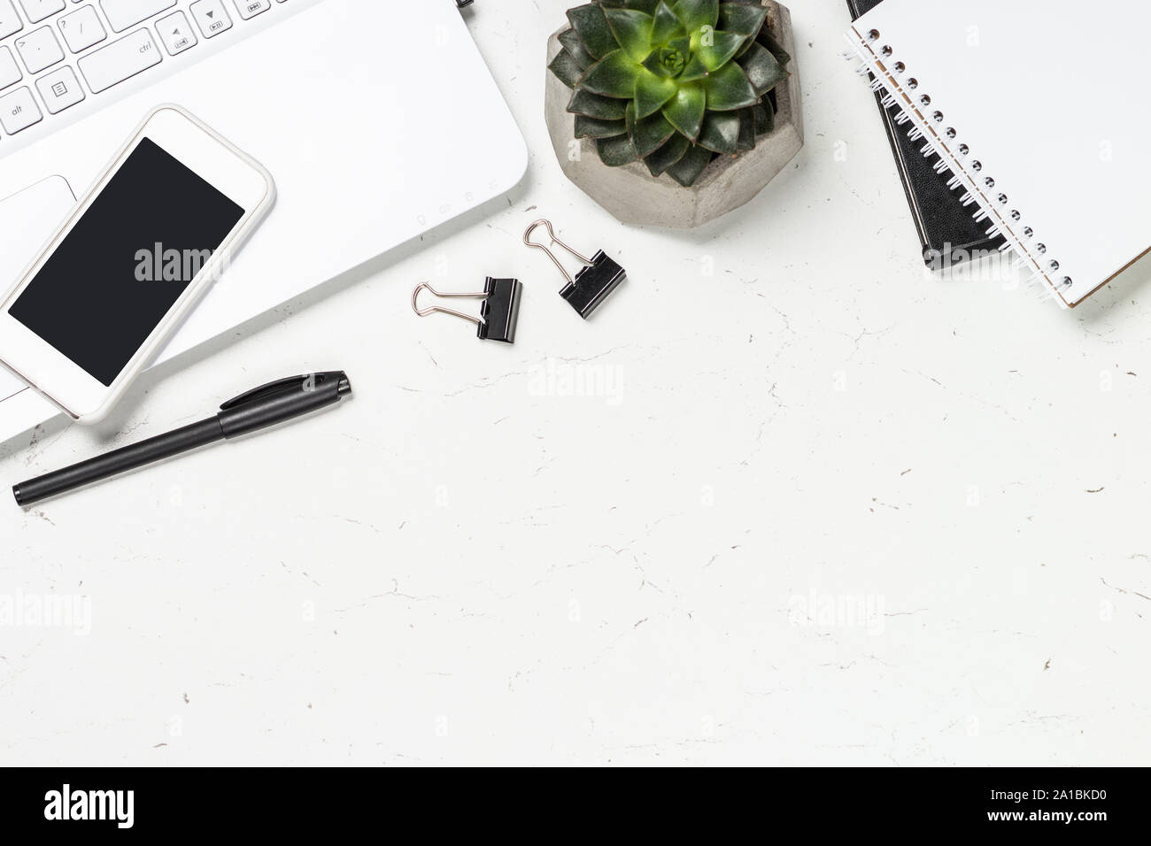 Office desk on white top view Stock Photo - Alamy