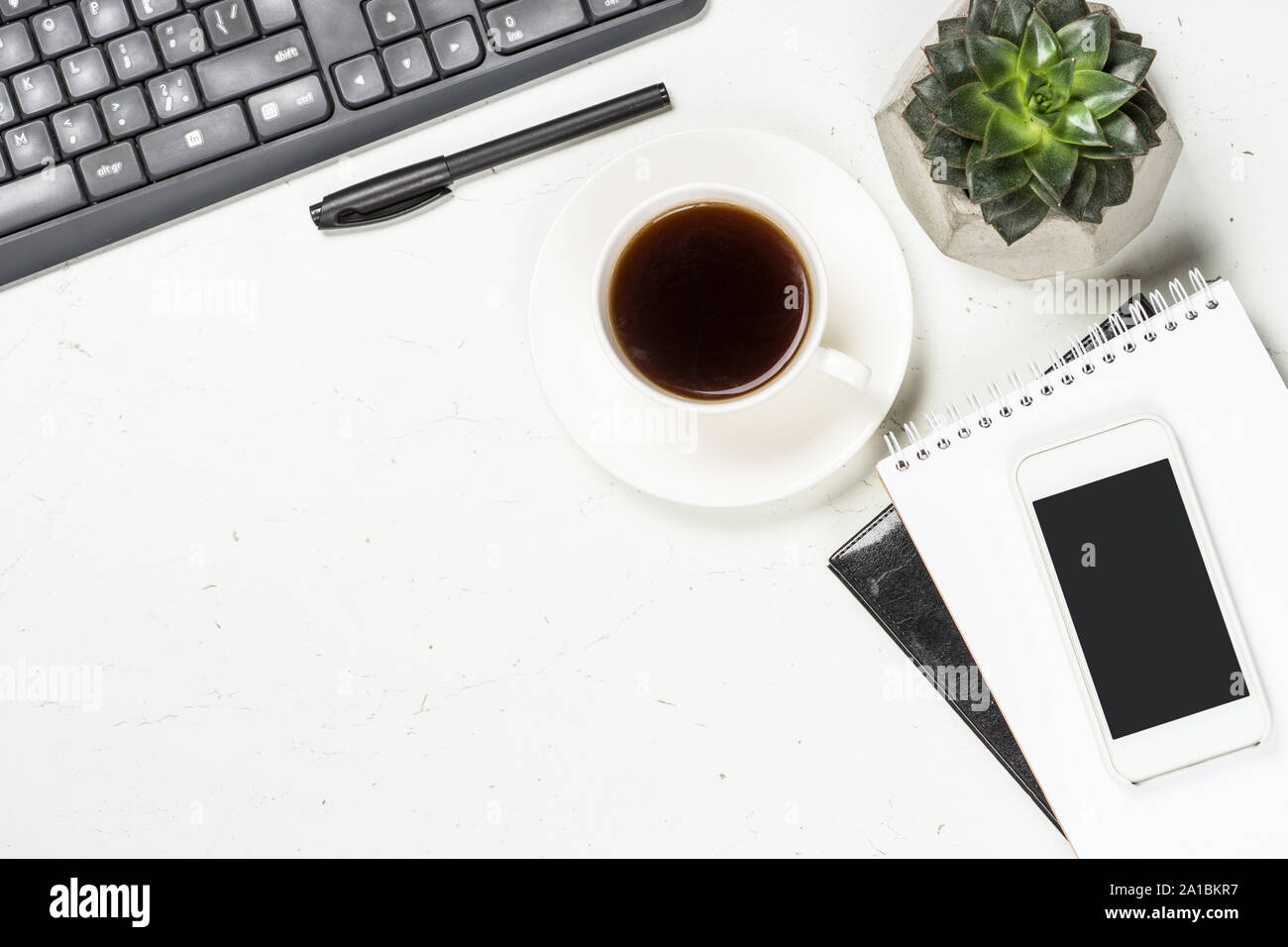 Office desk on white top view Stock Photo - Alamy