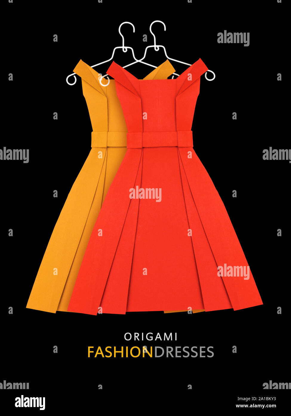 Origami paper yellow and red dresses Stock Photo - Alamy