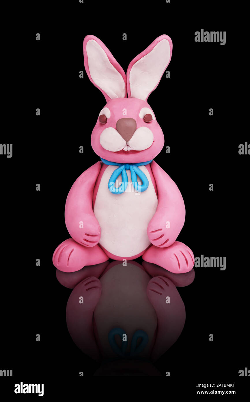 Pink plasticine rabbit Stock Photo - Alamy