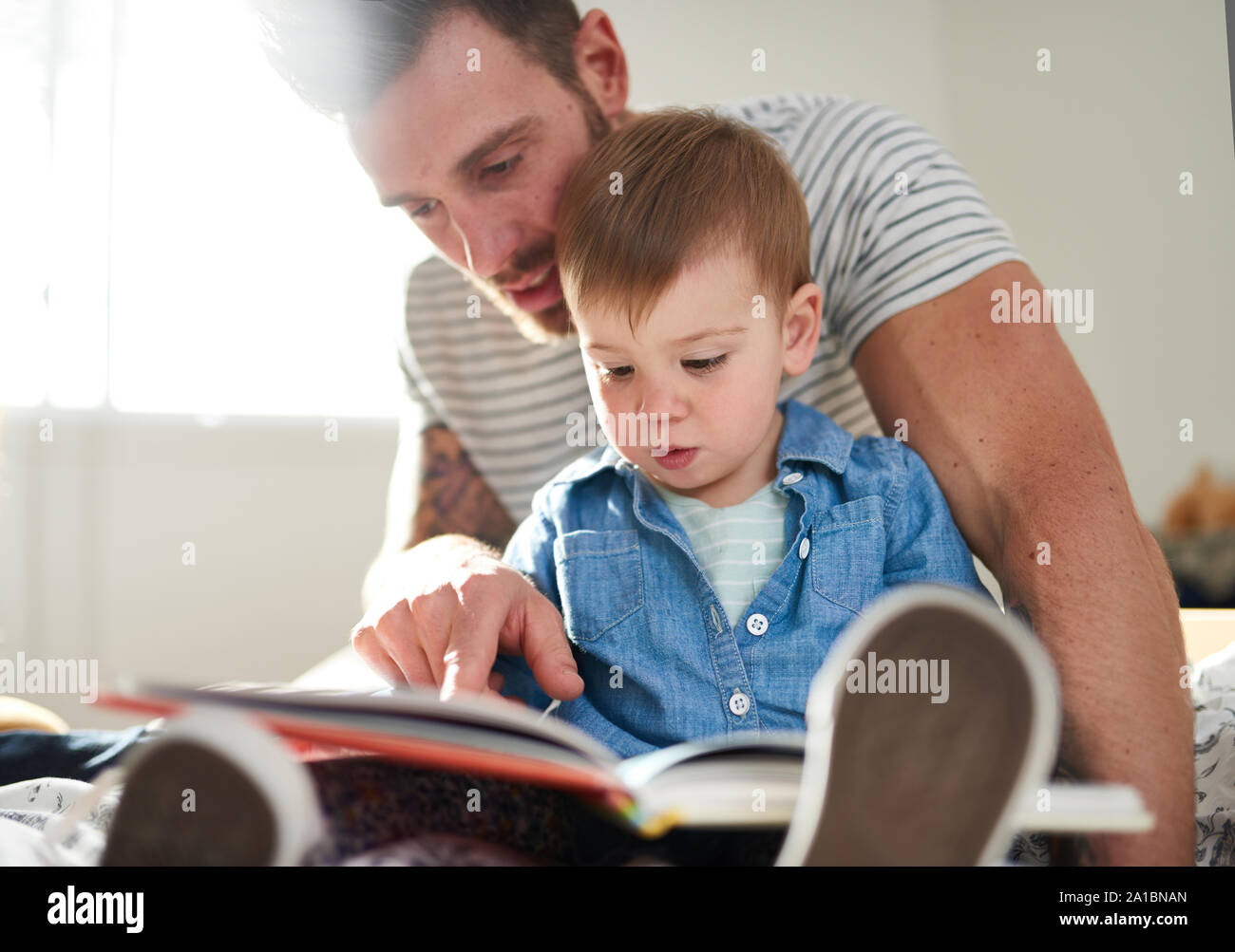 Father reading bedtime story hi-res stock photography and images - Alamy