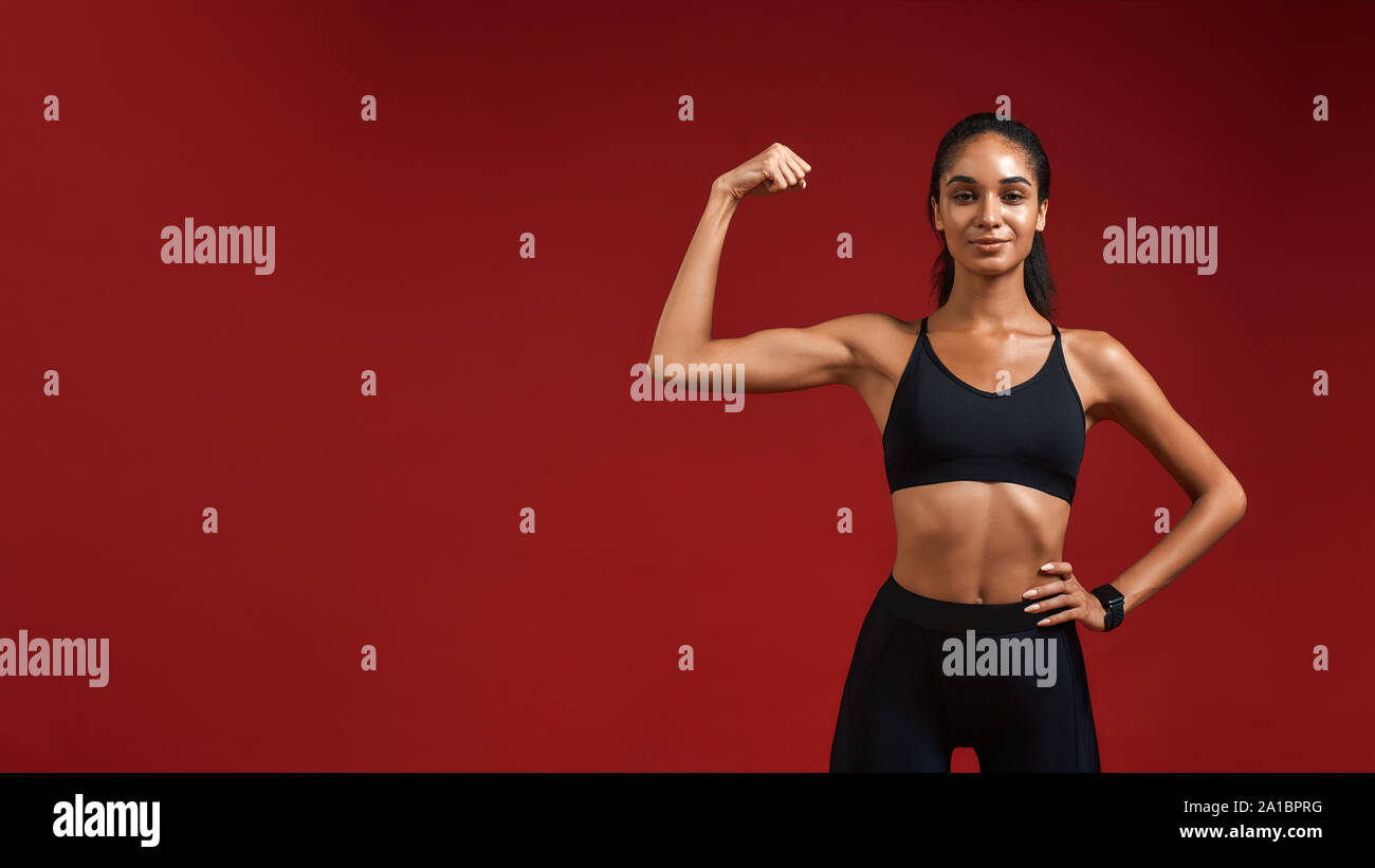Female flexing bicep muscle hi-res stock photography and images - Alamy