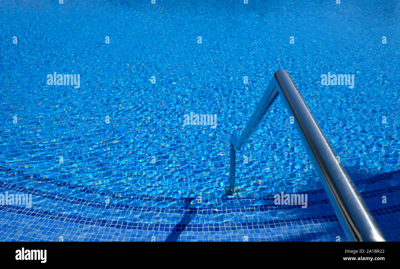 Ripples on the surface of an outdoor pool on a sunny day Stock Photo ...