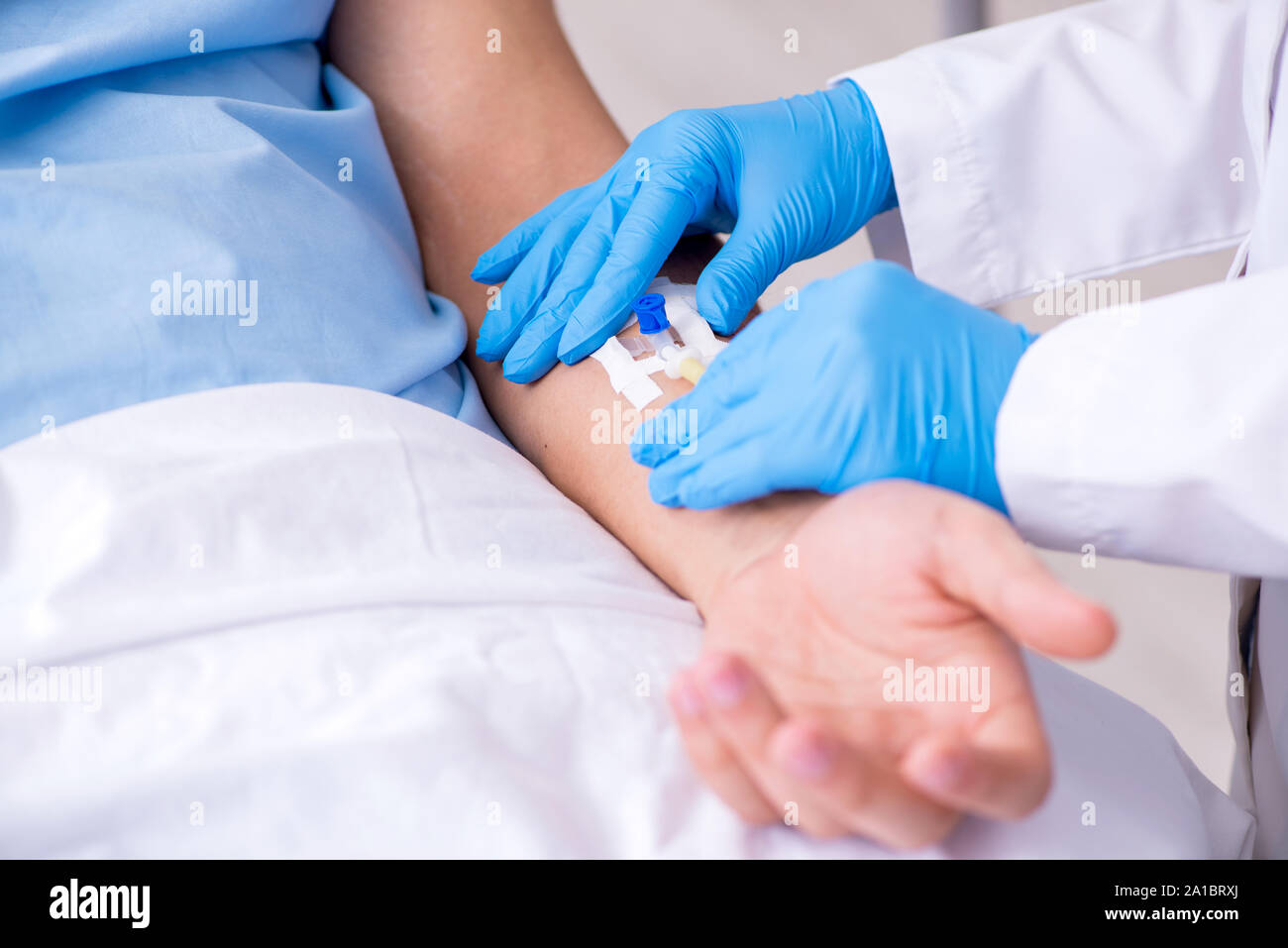The male patient in blood transfusion concept Stock Photo - Alamy