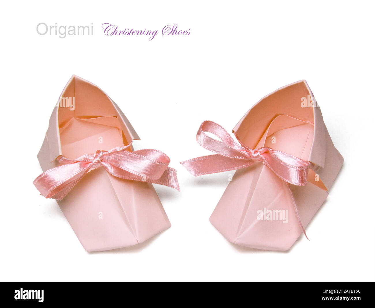 Paper baby girl shoes Stock Photo - Alamy