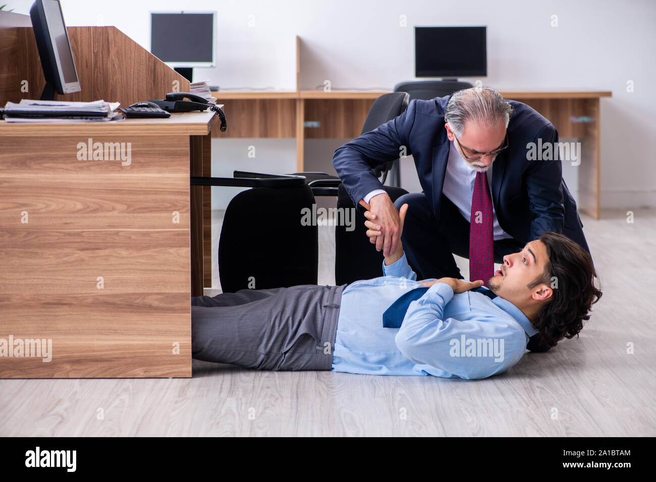 Businessman heart attack cpr hi-res stock photography and images - Alamy