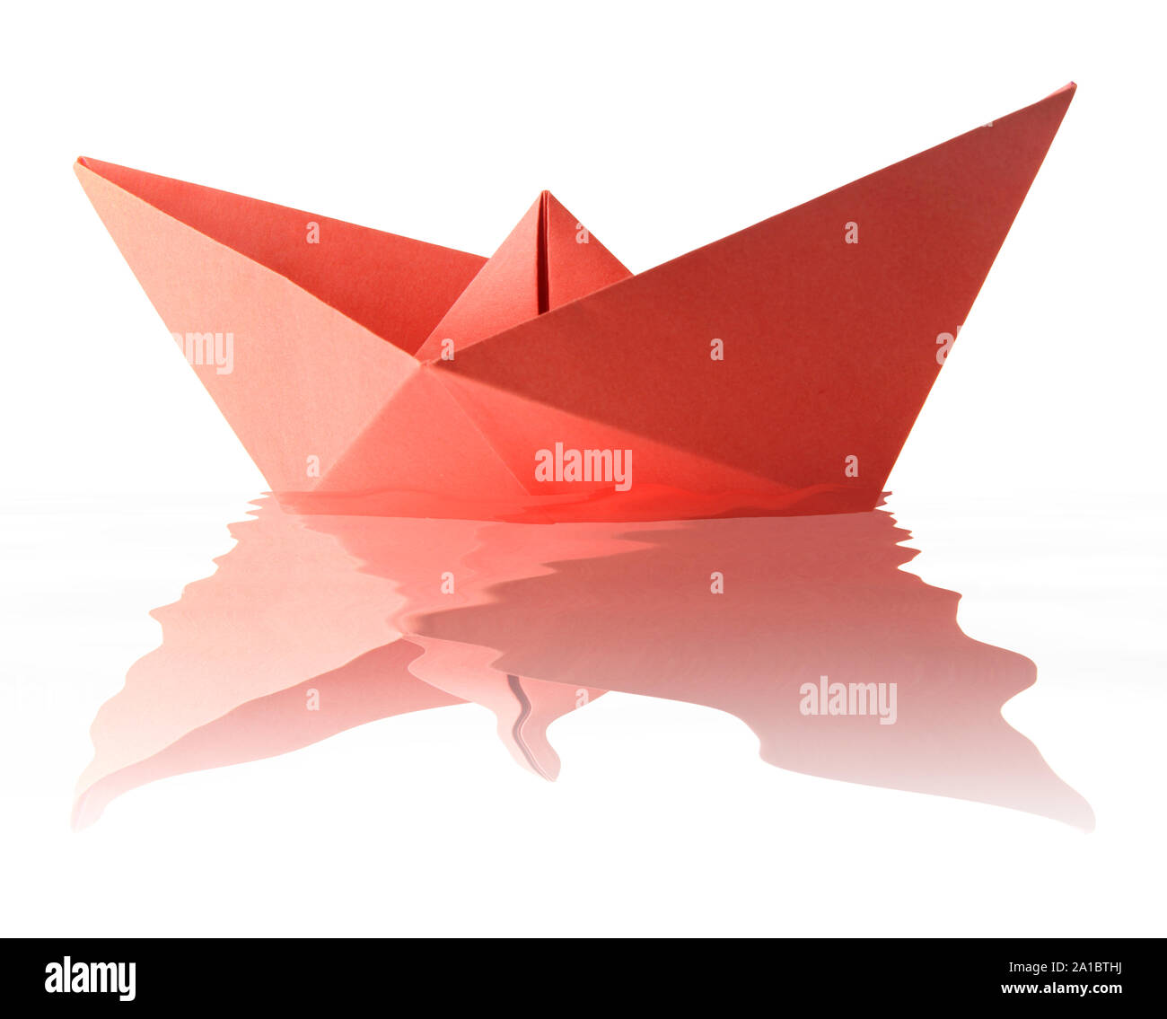 Origami red boat Stock Photo - Alamy