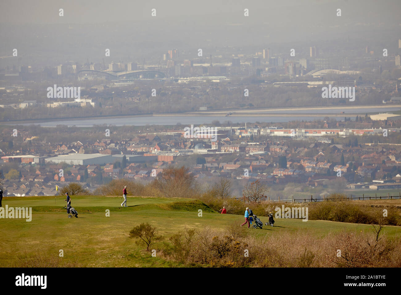Tameside boarder Werneth Low golf course with Manchester skyline beyond ...