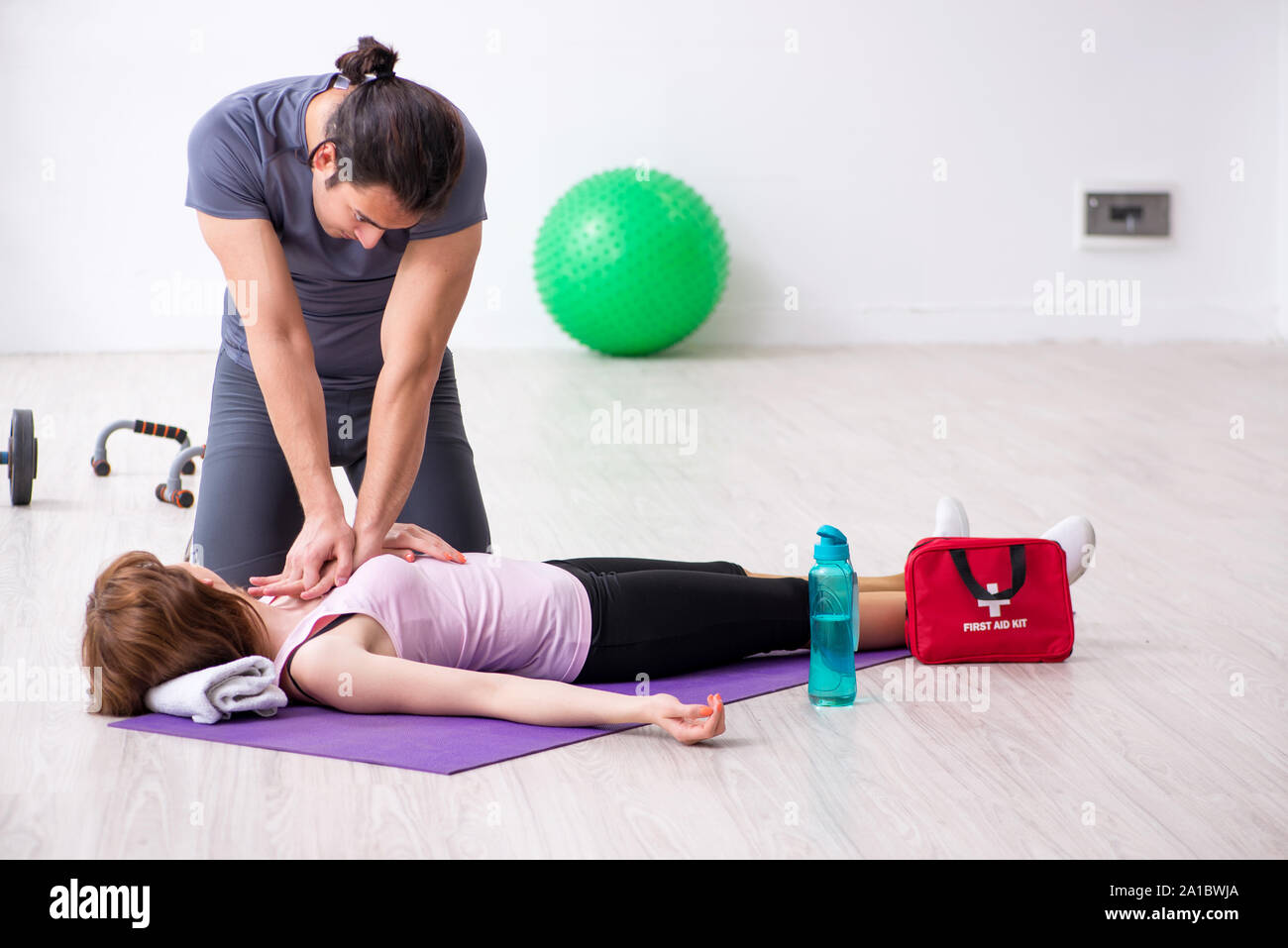 The young woman feeling bad during training in first aid concept Stock ...