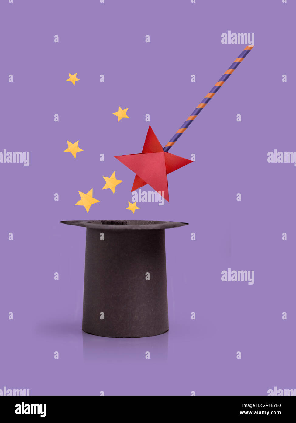Magic wand and cylinder hat Stock Photo - Alamy
