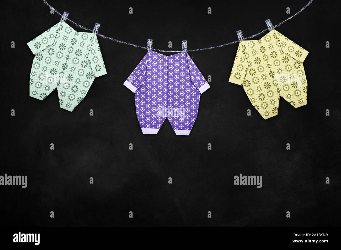 Baby boy Clothing on Clothesline Stock Photo - Alamy