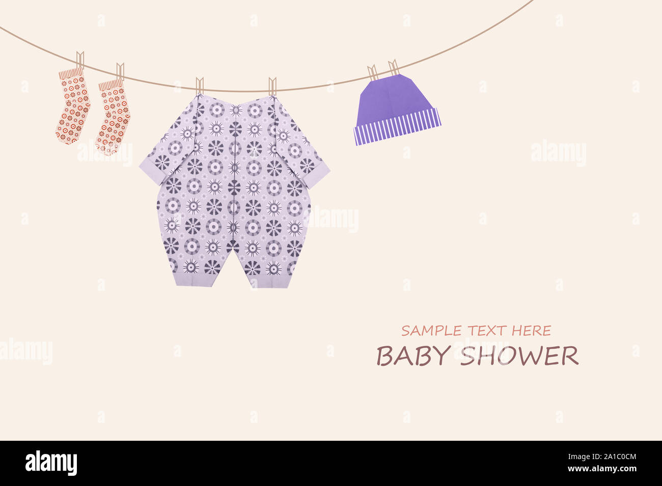 Baby boy in sleepsuit origami Stock Photo - Alamy
