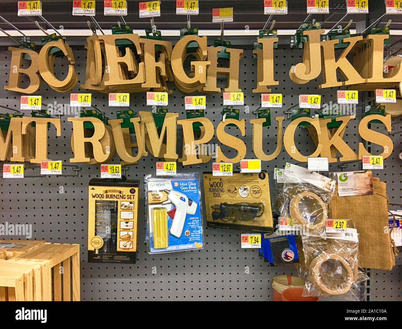 Letters in an store rearranged to spell "TRUMP SUCKS Stock Photo - Alamy
