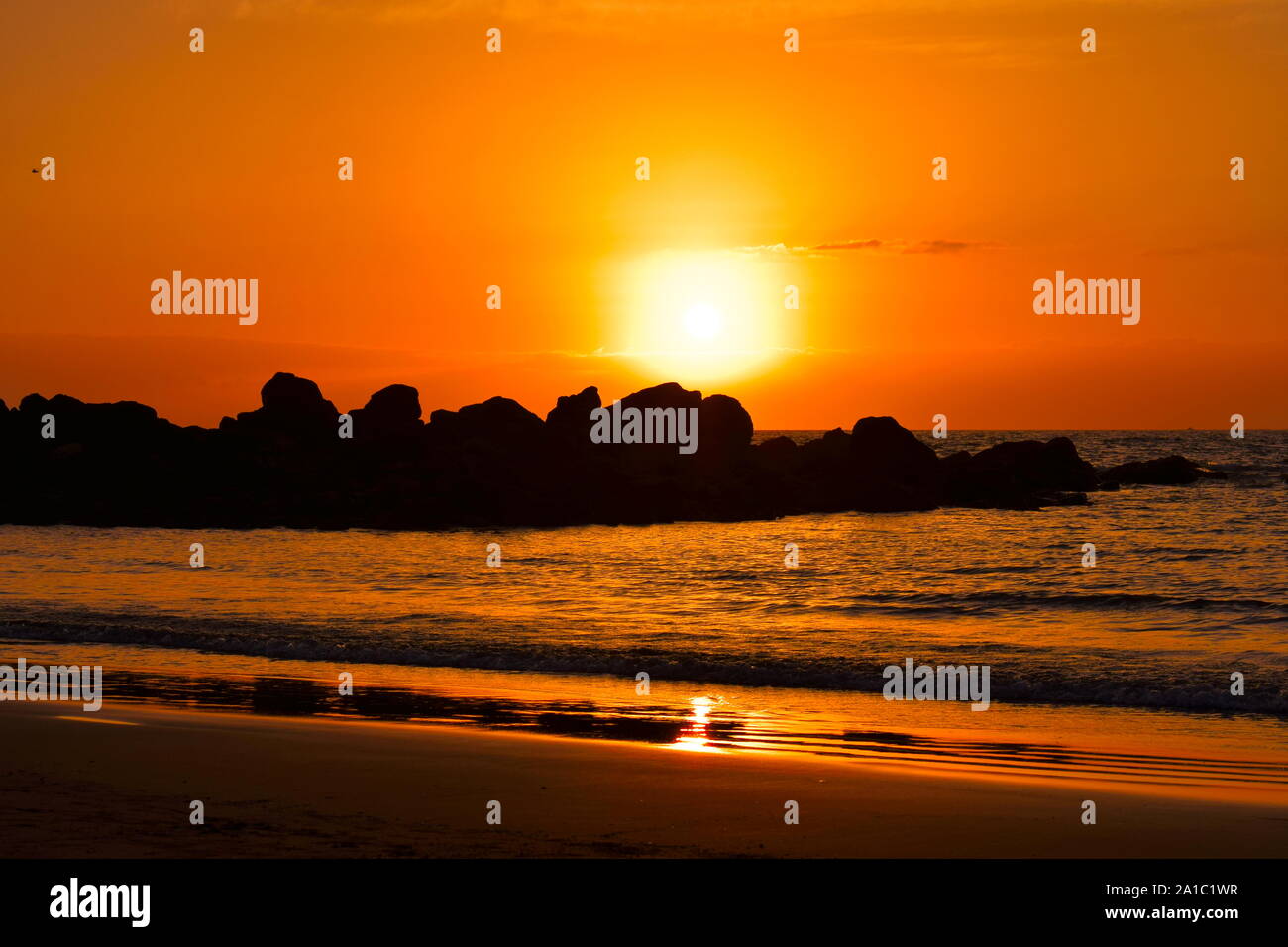 Brilliant Sunset with reflecting Ocean Stock Photo - Alamy
