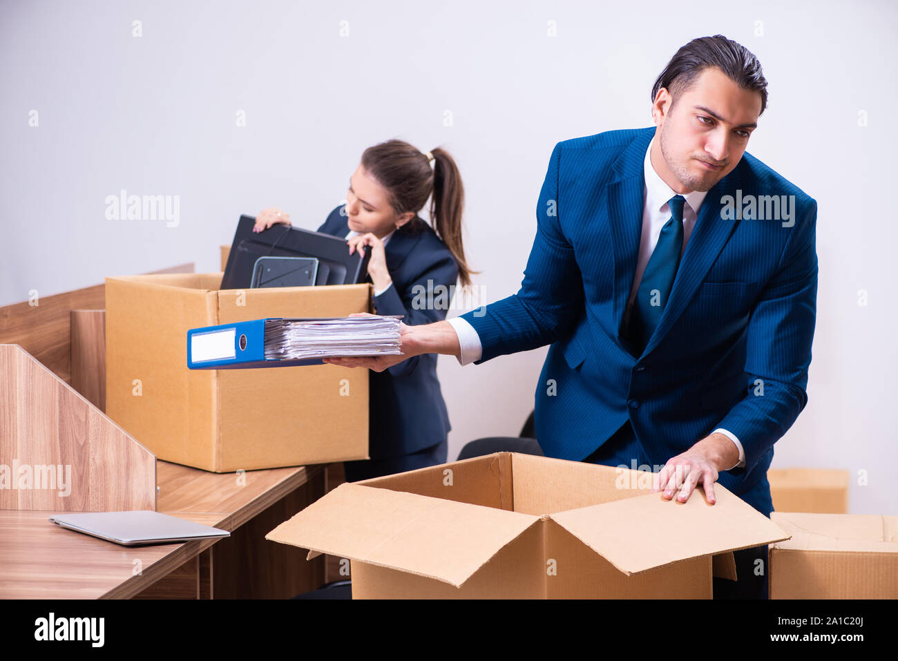 The two employees being fired from their work Stock Photo - Alamy