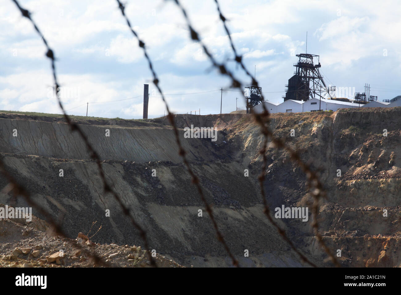The Butte, Montana Berkeley Pit and mining head frame is viewed through ...