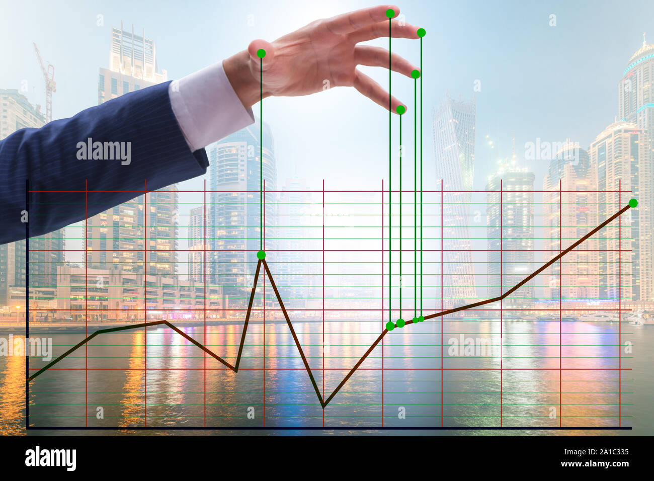 The businessman controlling the market with strings Stock Photo - Alamy