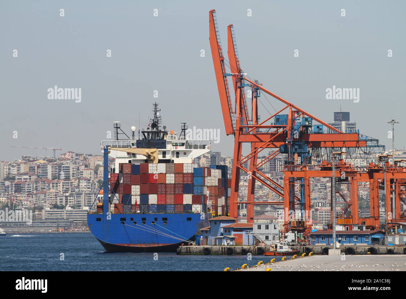 Container Ship is loading in a port Stock Photo - Alamy