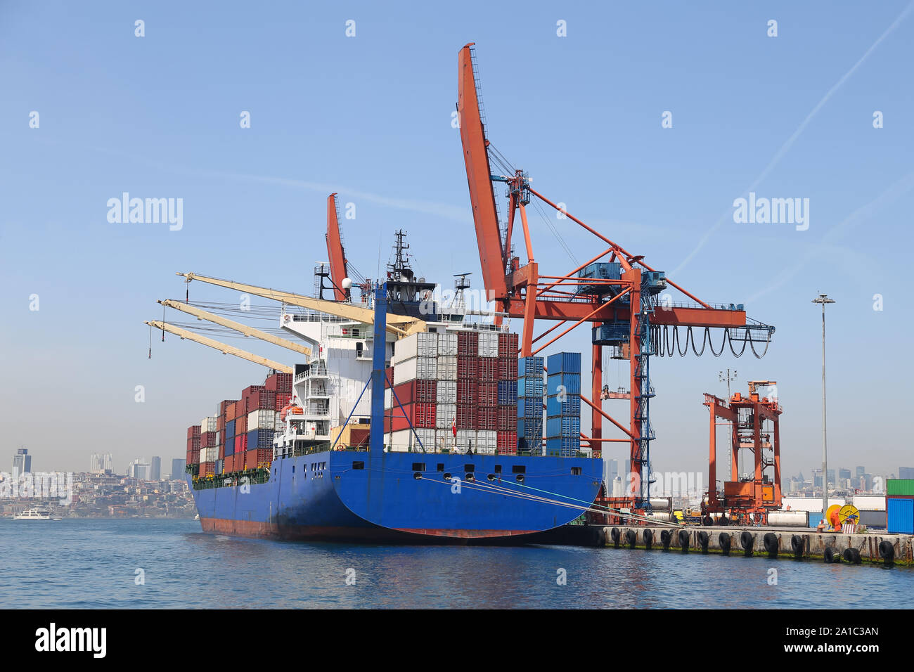 Container Ship is loading in a port Stock Photo - Alamy