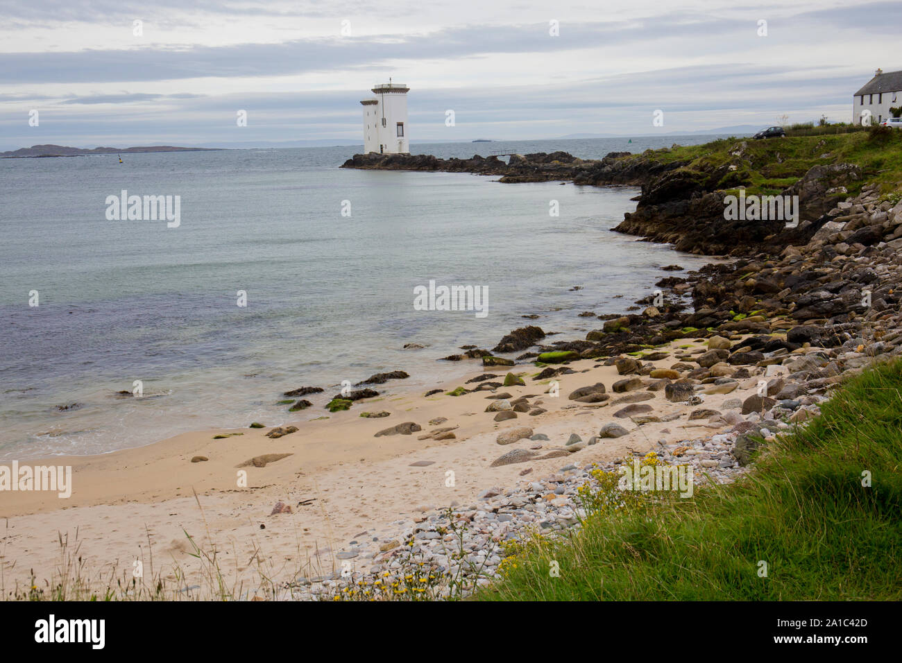 Carraig Fhada lighthouse near Port Ellen, Islay, Scotland Stock Photo ...