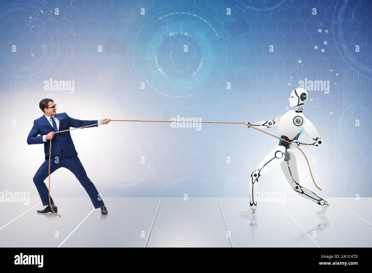 The competition between humans and robots in tug of war concept Stock ...