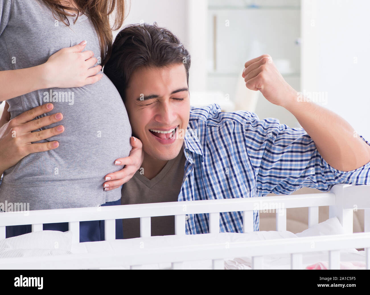 The young parents expecting their first baby Stock Photo - Alamy
