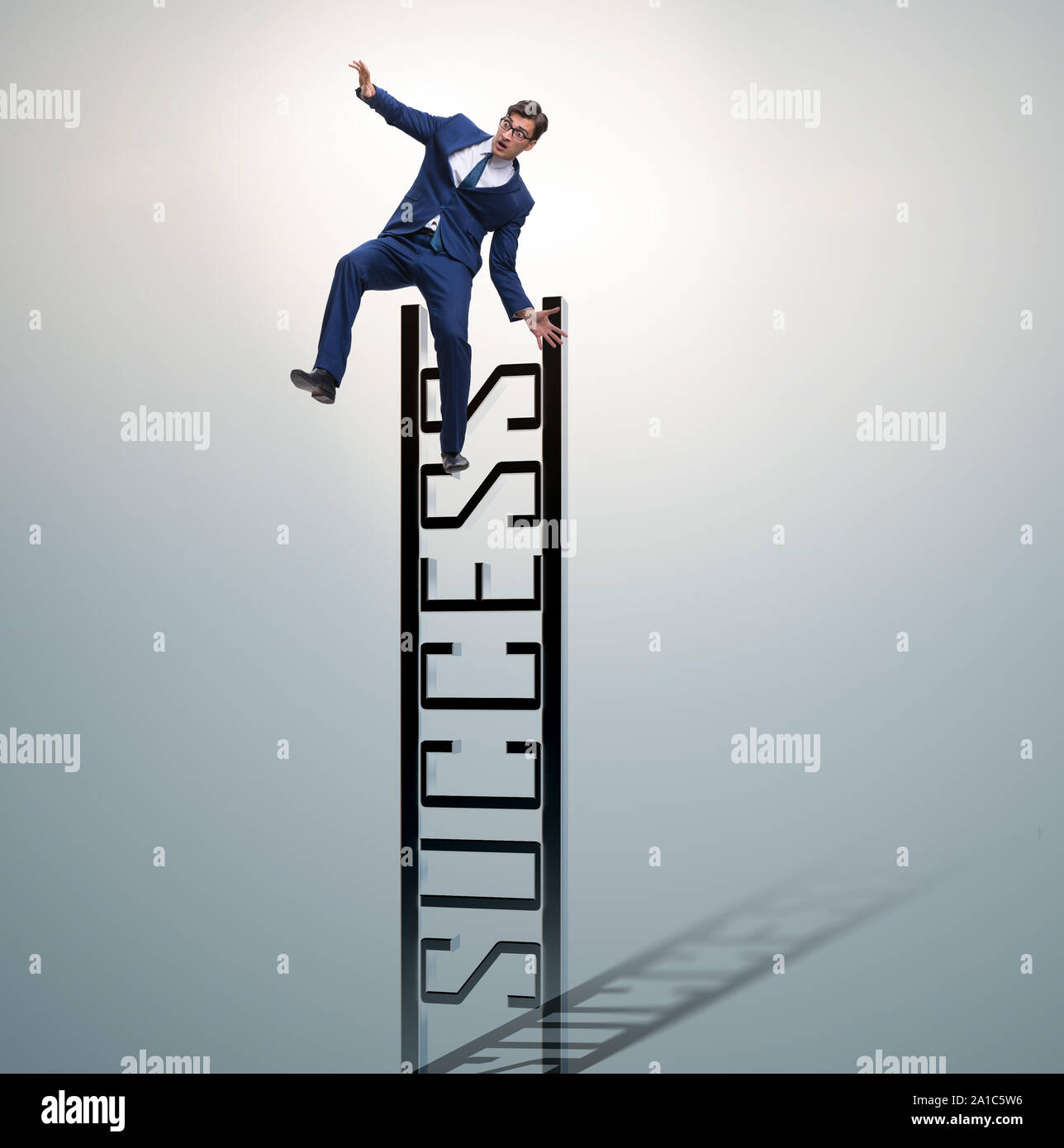 The businessman slipping from the top of ladder Stock Photo - Alamy
