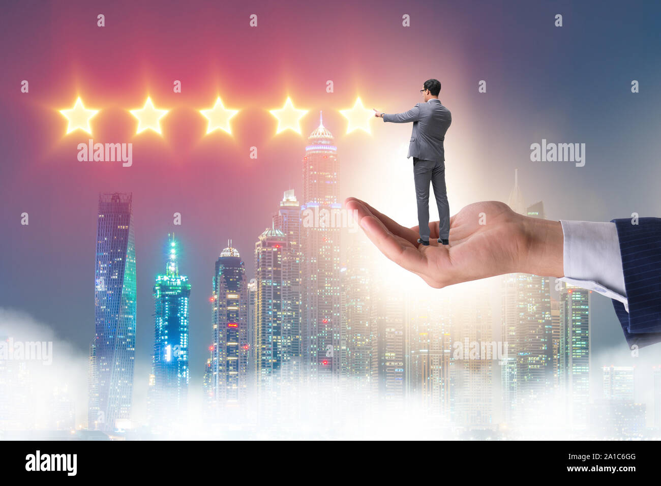 The businessman held on hand reaching out for stars Stock Photo - Alamy