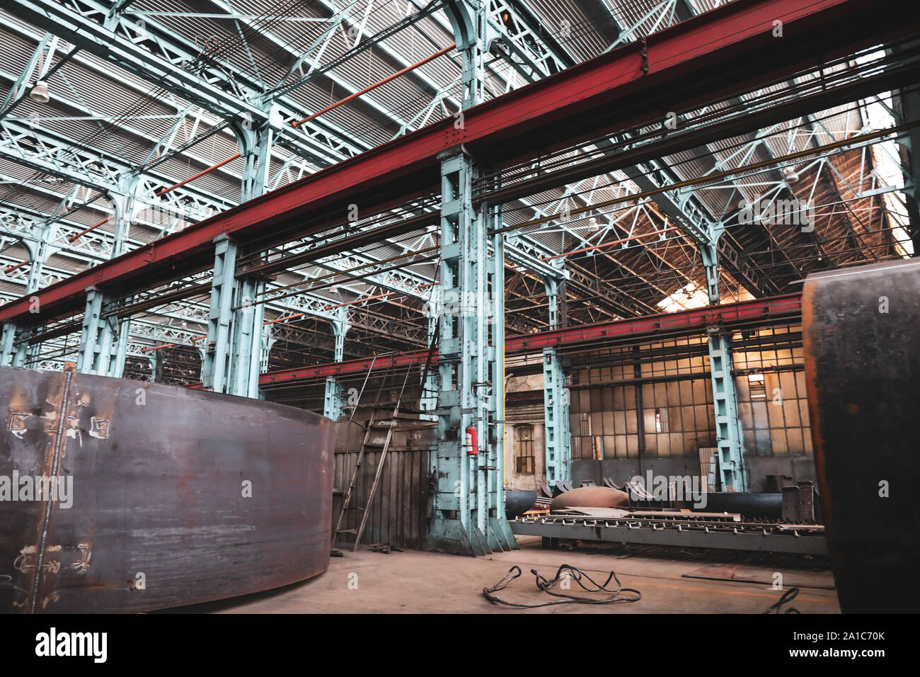 Dirty and old but still functioning metal works, old fashioned, factory ...