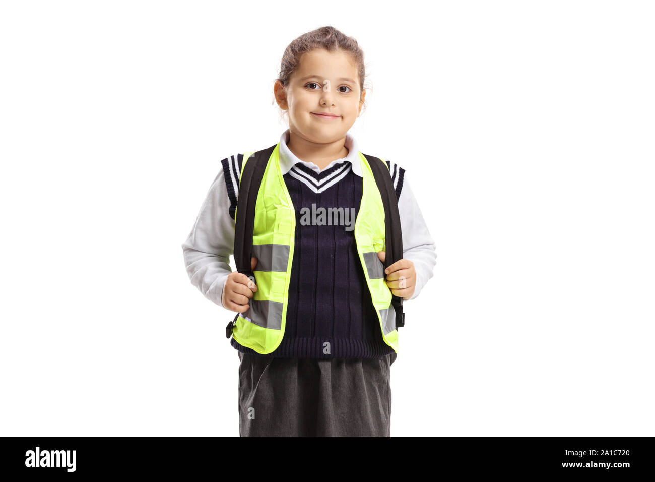 Schoolgirl wearing a safety vest isolated on white background Stock ...
