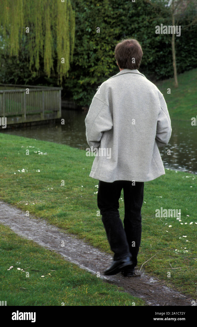 Alone man walking sad hi-res stock photography and images - Alamy