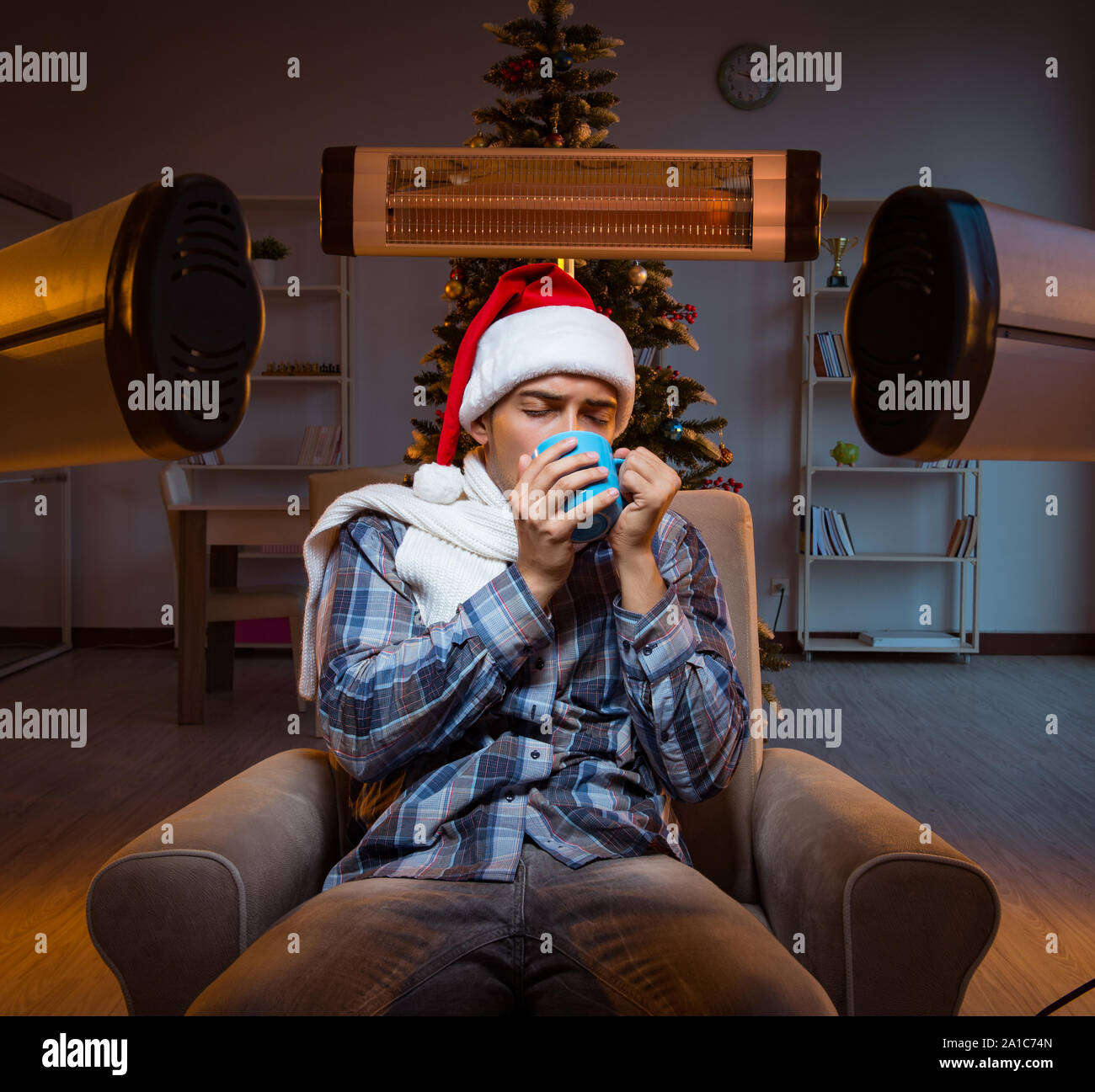 The man suffering from cold at home Stock Photo - Alamy