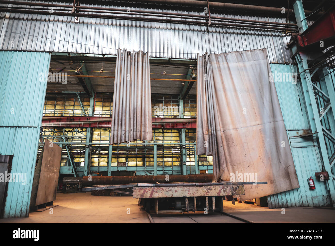 Dirty and old but still functioning metal works, old fashioned, factory ...