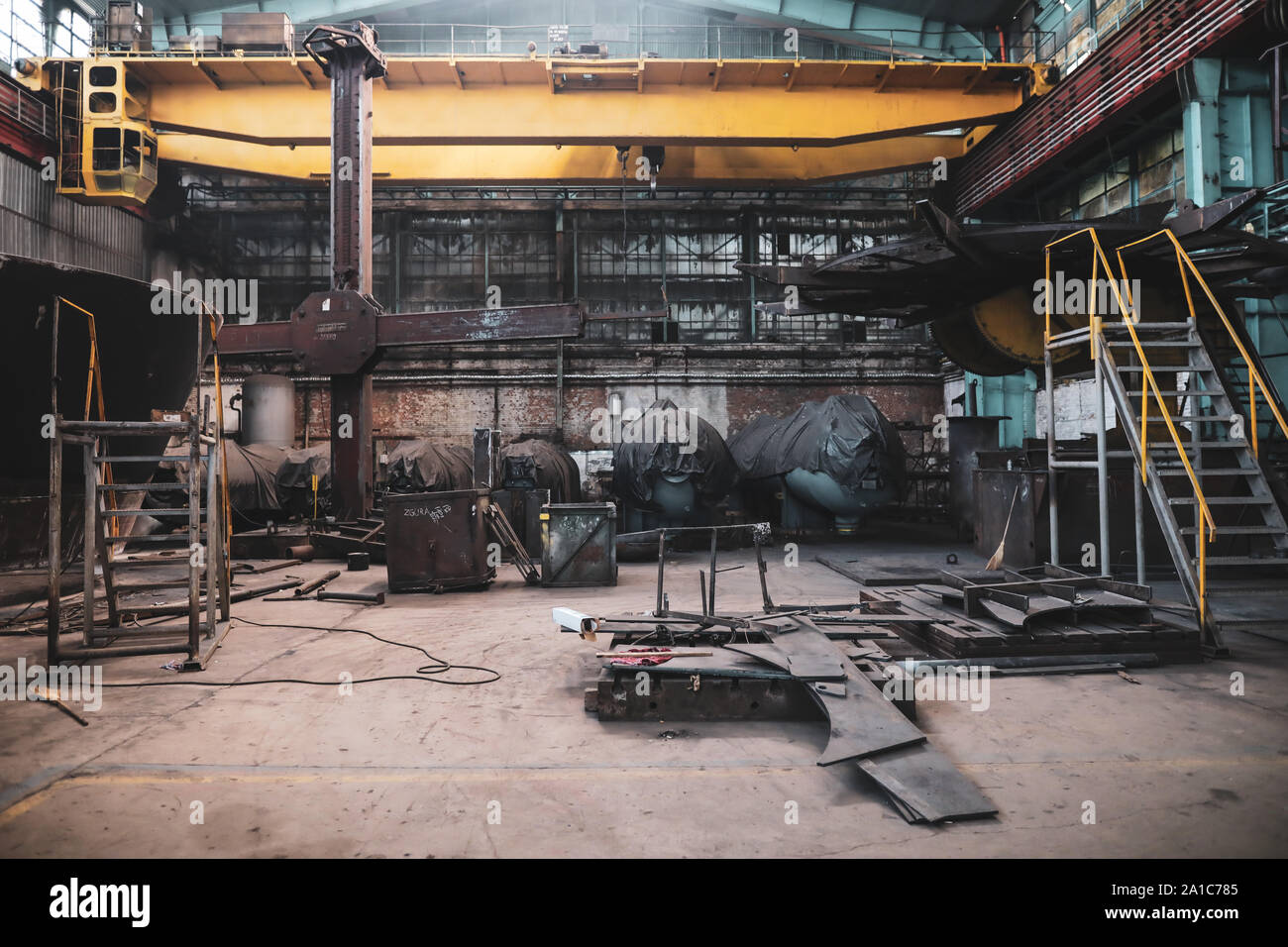 Dirty and old but still functioning metal works, old fashioned, factory ...