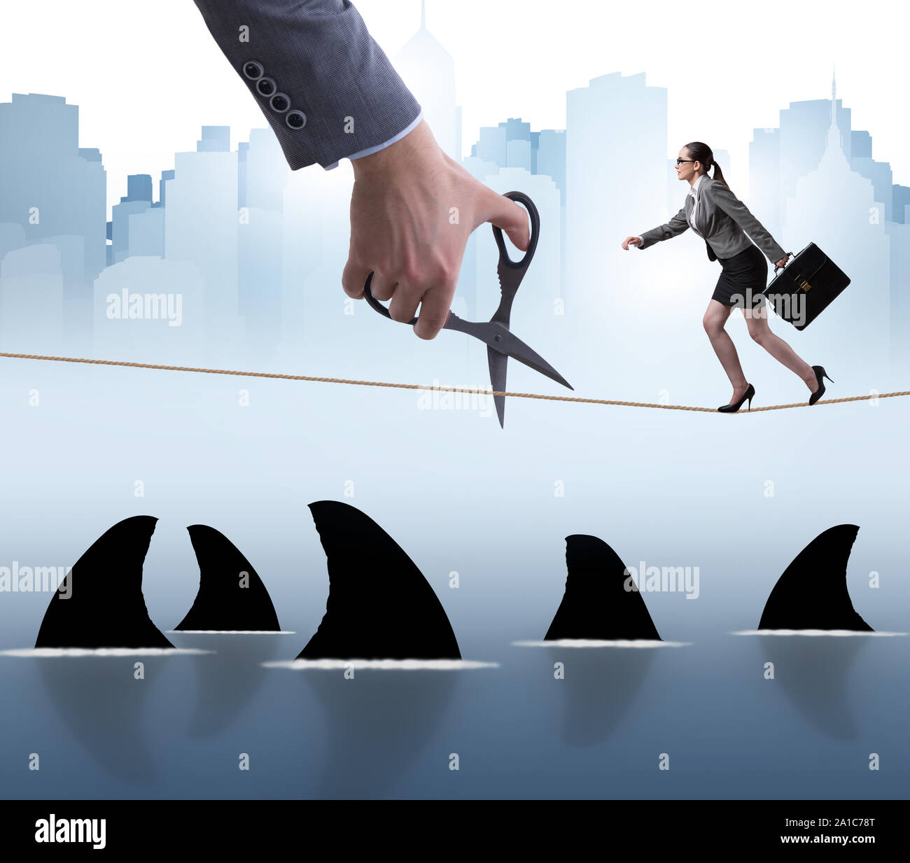 The hand cutting rope in business risk concept Stock Photo - Alamy