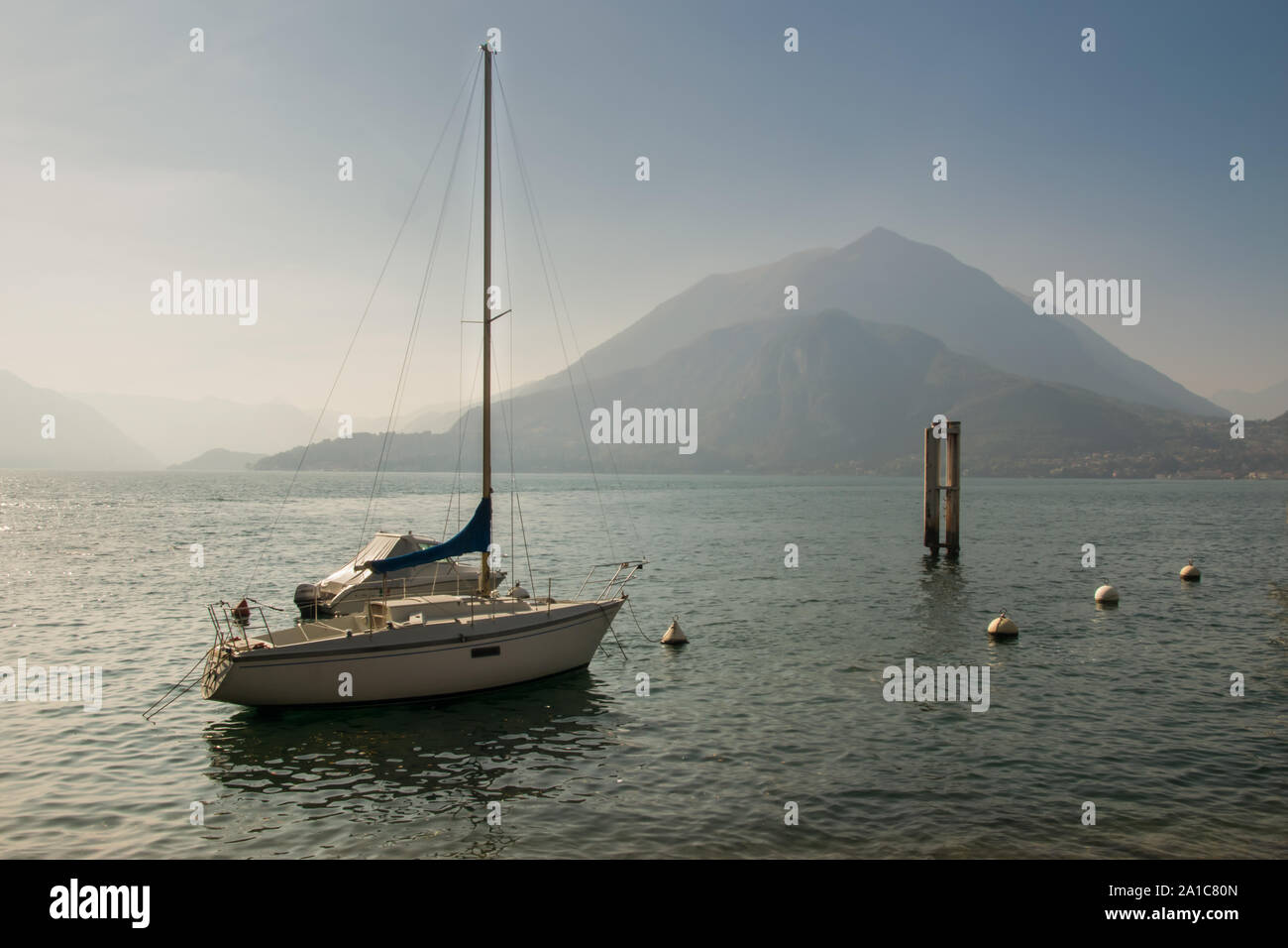 Boat floating in Lake Como Stock Photo - Alamy