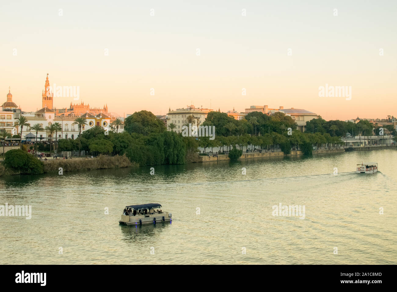 Spain seville boats floating hi-res stock photography and images - Alamy