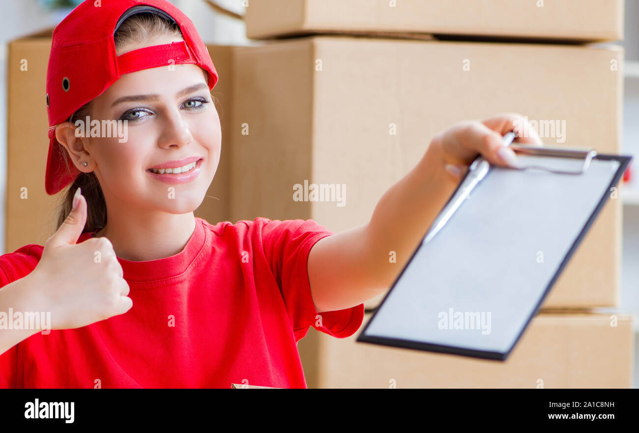 The young woman delivering boxes of personal effects Stock Photo - Alamy