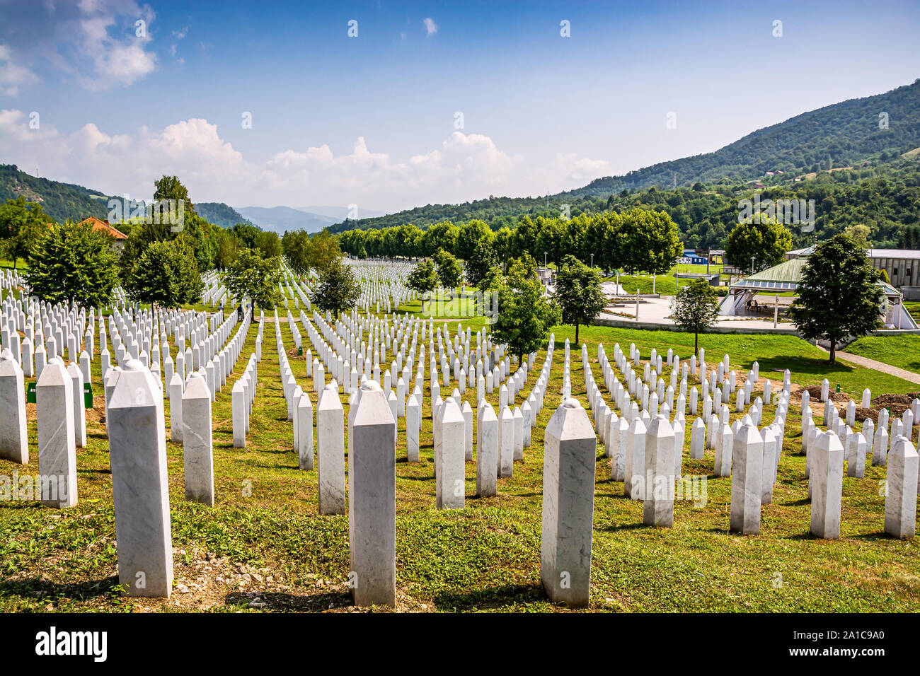 Potocari, Bosnia and Herzegovina - July 31, 2019. White tombstones as a ...