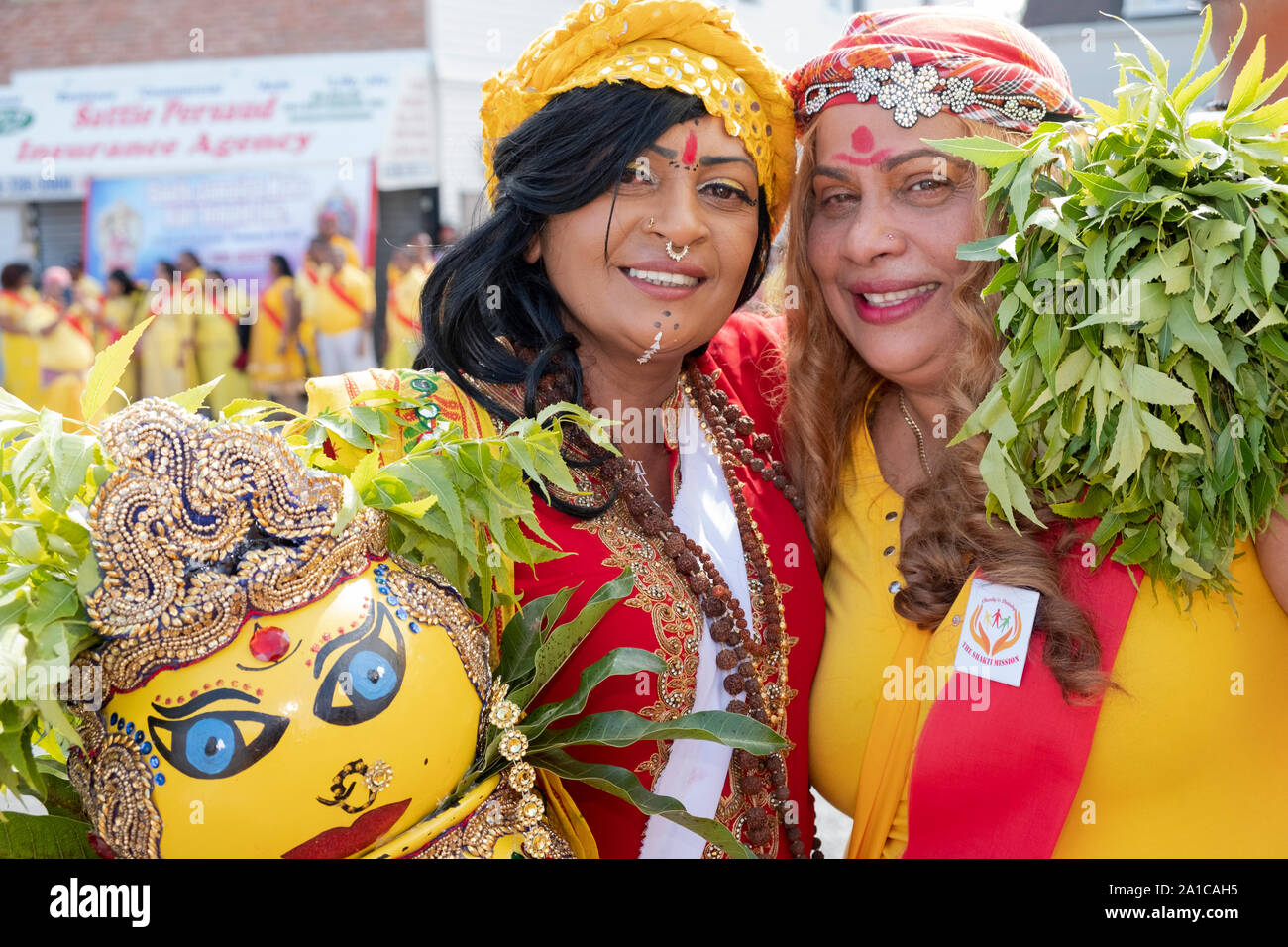 Beautiful Hindu sisters in costumes pose the Madrassi Parade for unity ...