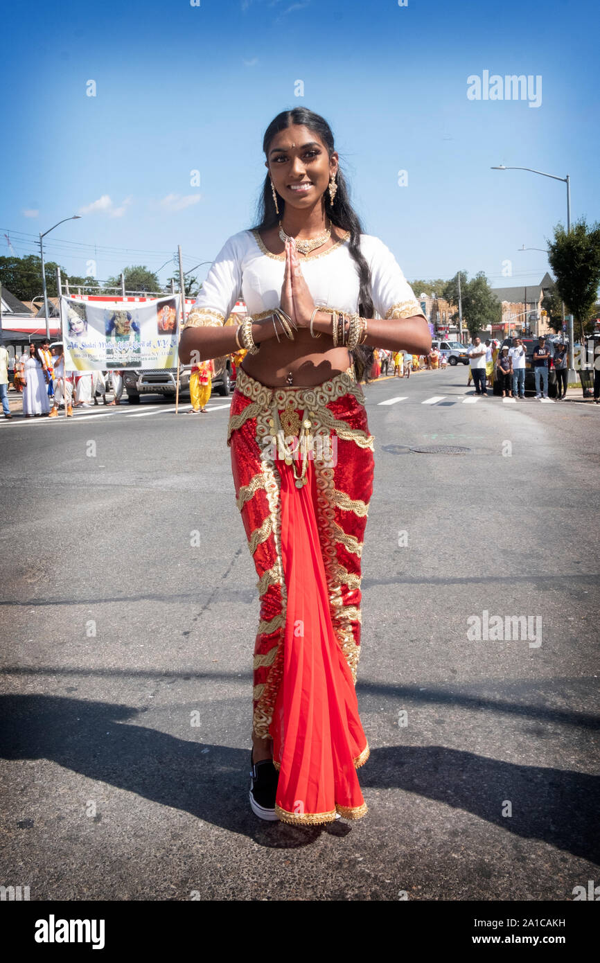 A beautiful young Hindu dancer pauses for a portrait at the Madrassi ...