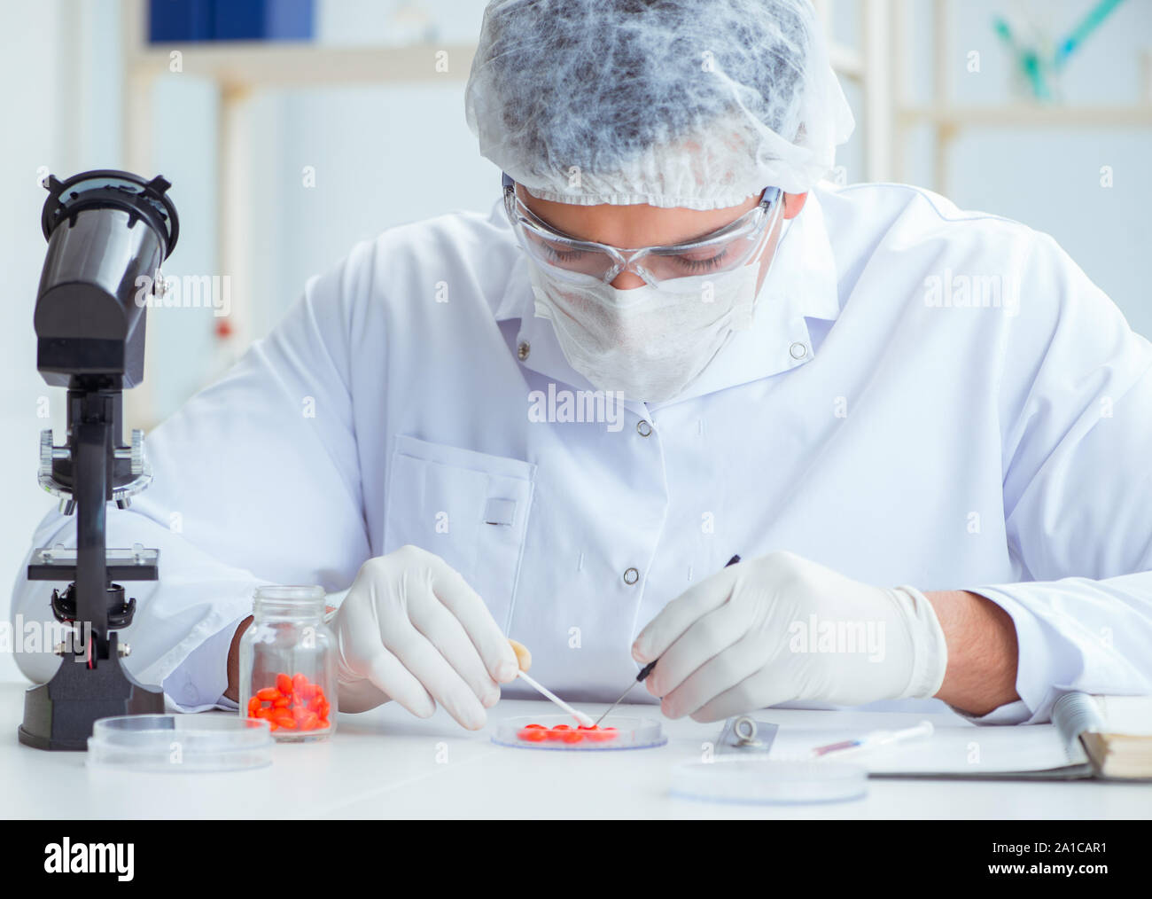 The doctor testing new drugs for medical purposes Stock Photo - Alamy