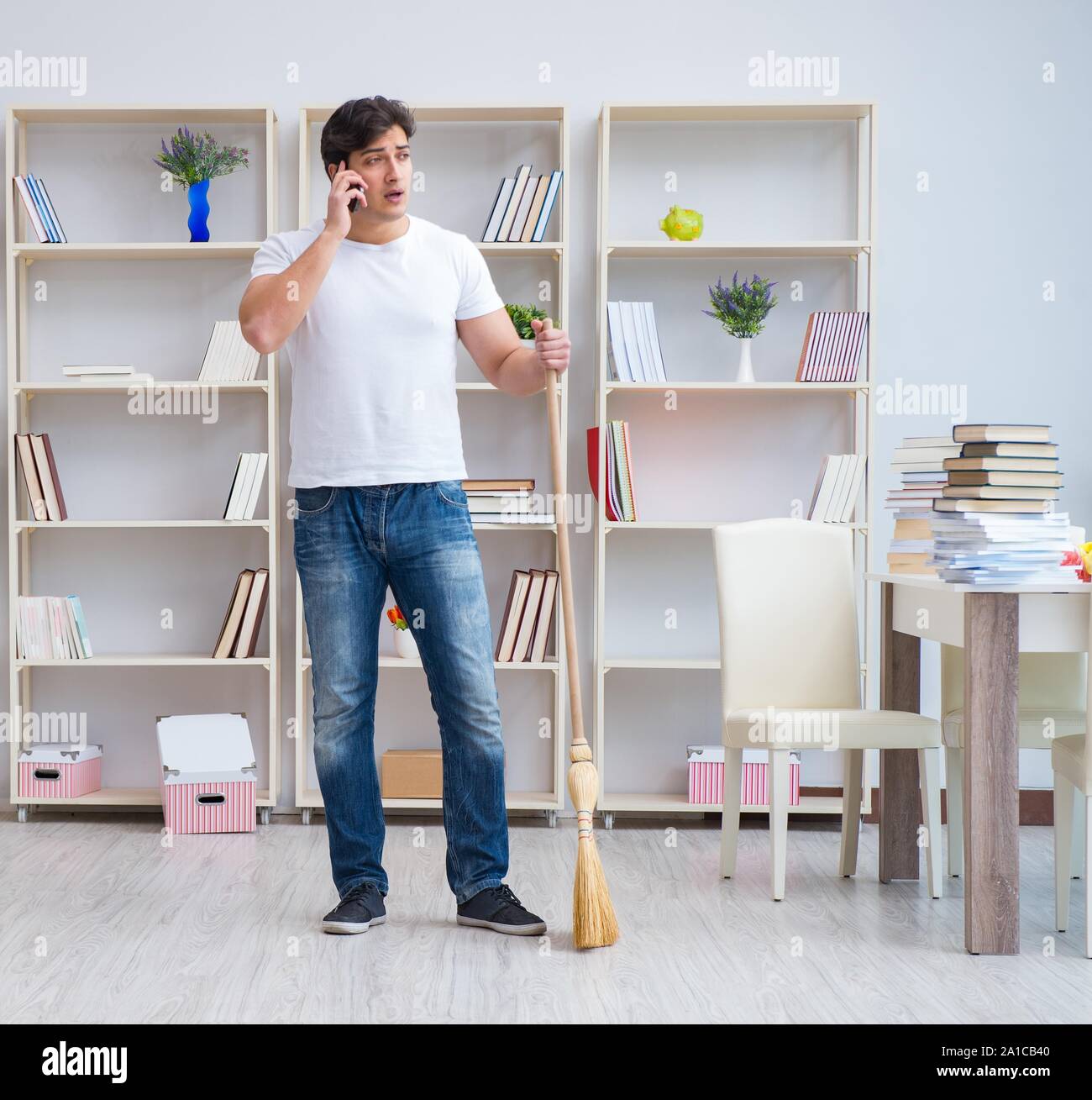 The man doing cleaning at home Stock Photo - Alamy