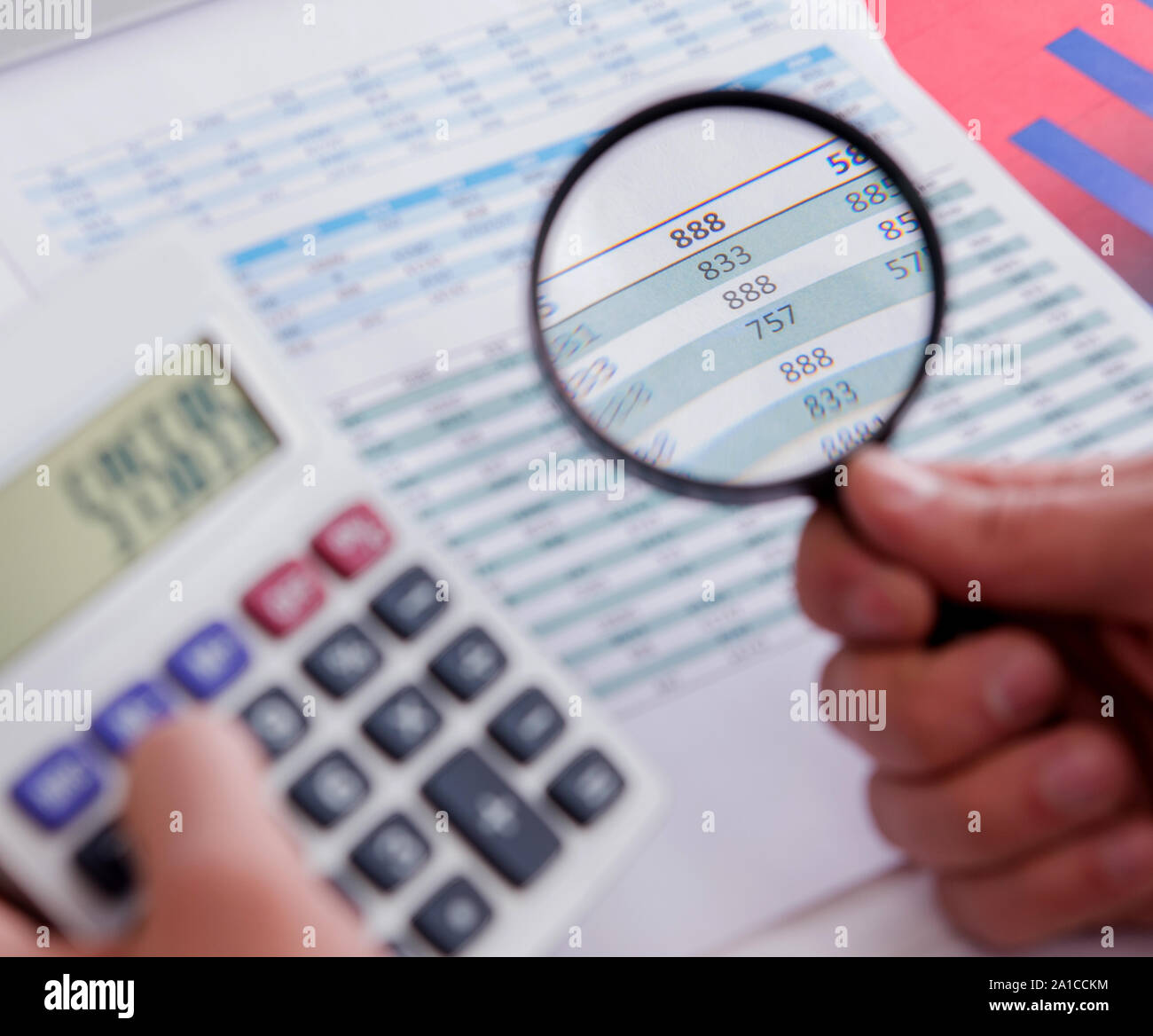 Finance analyst looking and financial reports hi-res stock photography ...