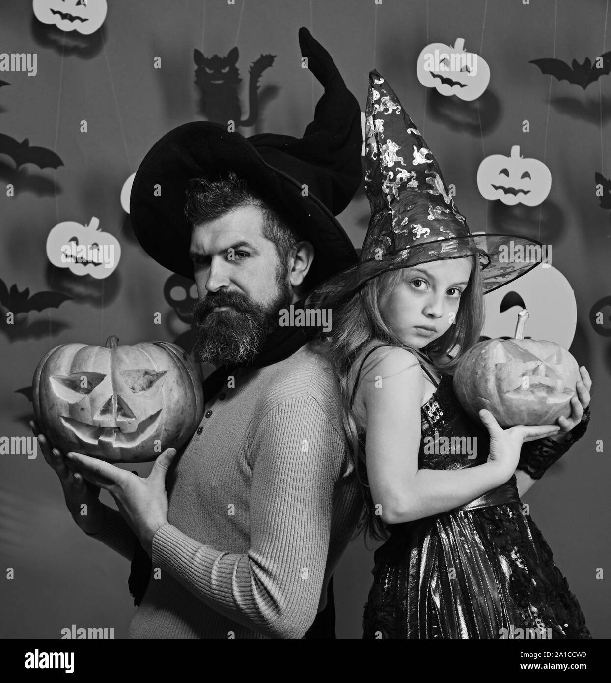Dad and daughter in costumes. Halloween party and holiday concept ...