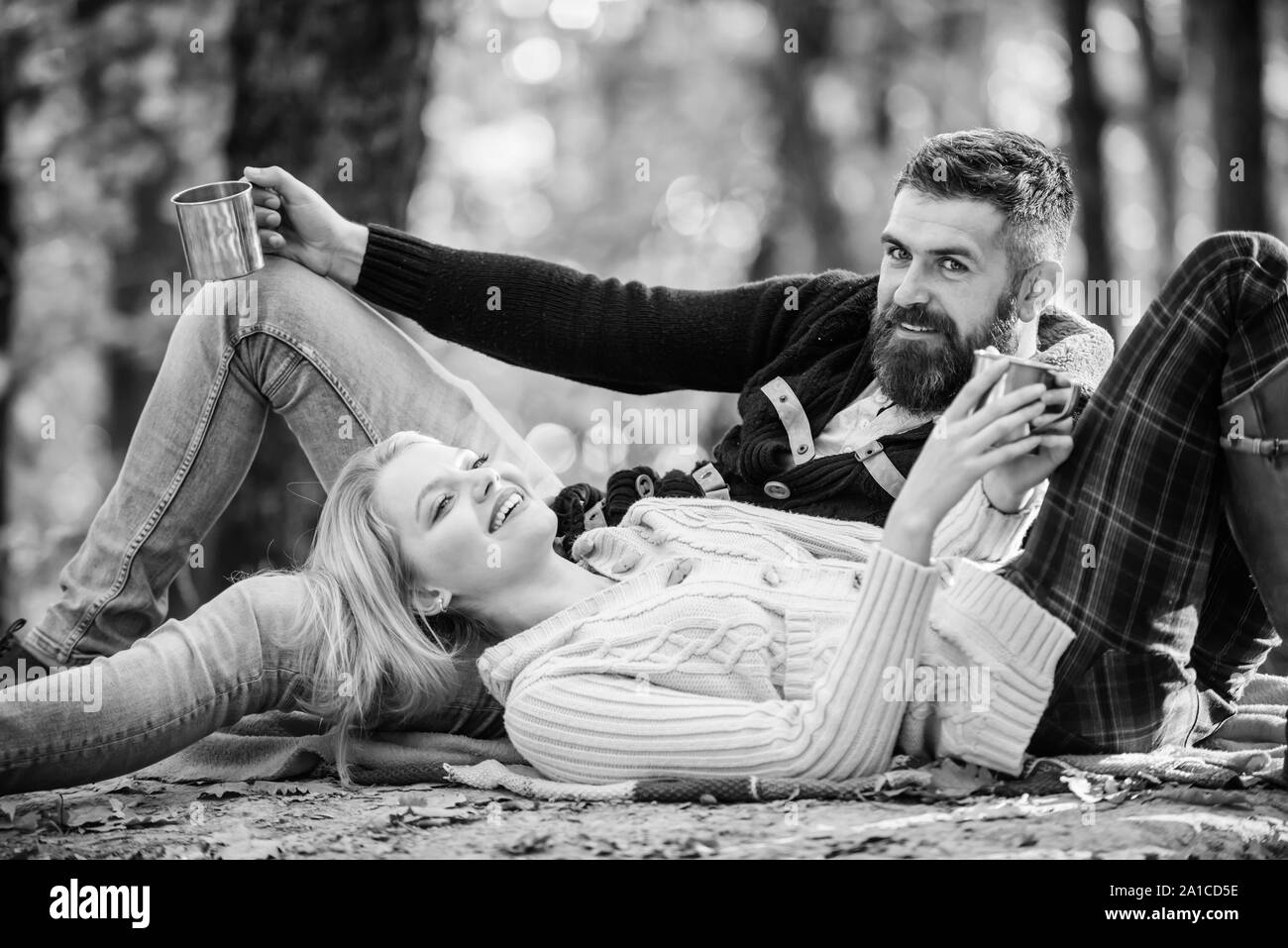 Romantic picnic forest. Couple in love tourists relaxing on picnic ...