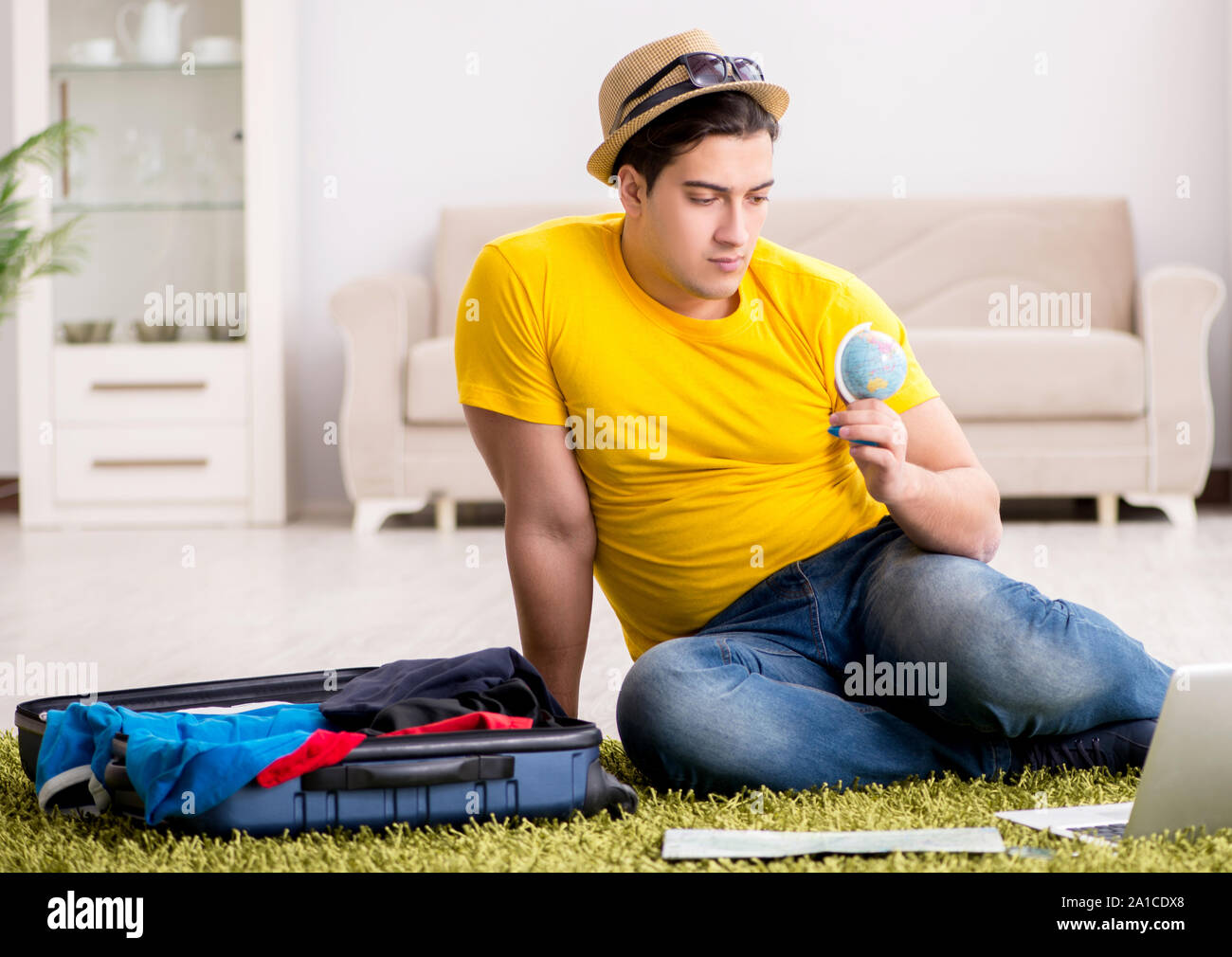 The man planning his vacation trip with map Stock Photo - Alamy