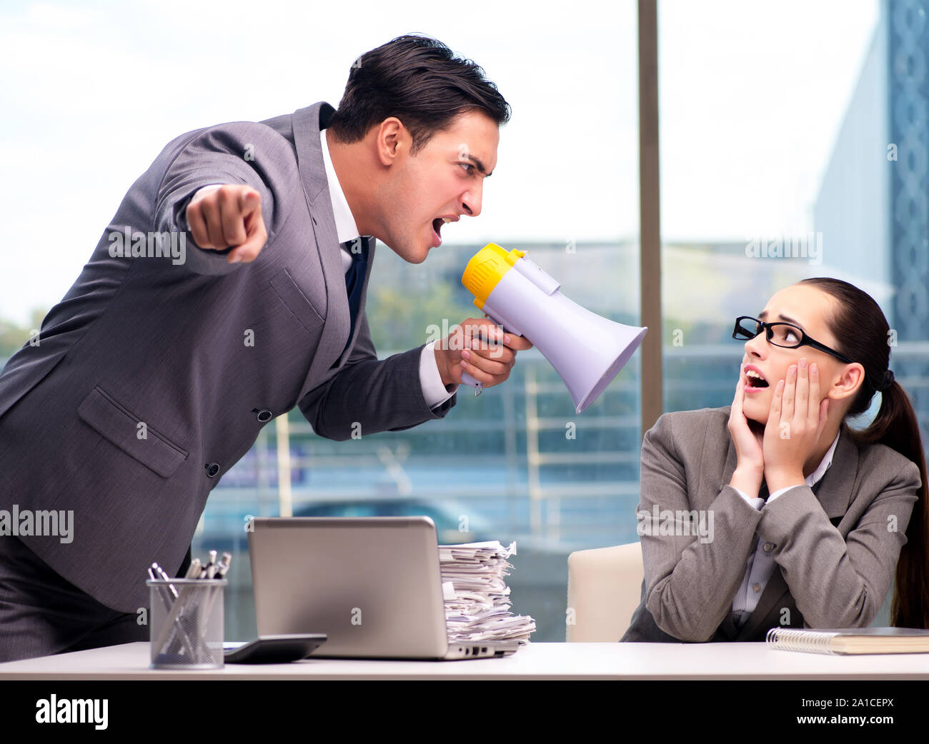 The boss yelling at his team member Stock Photo - Alamy
